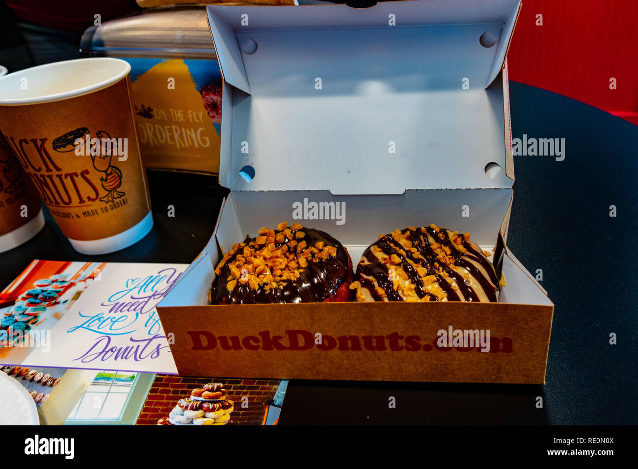 Glazed donuts in a box hi-res stock photography and images - Alamy