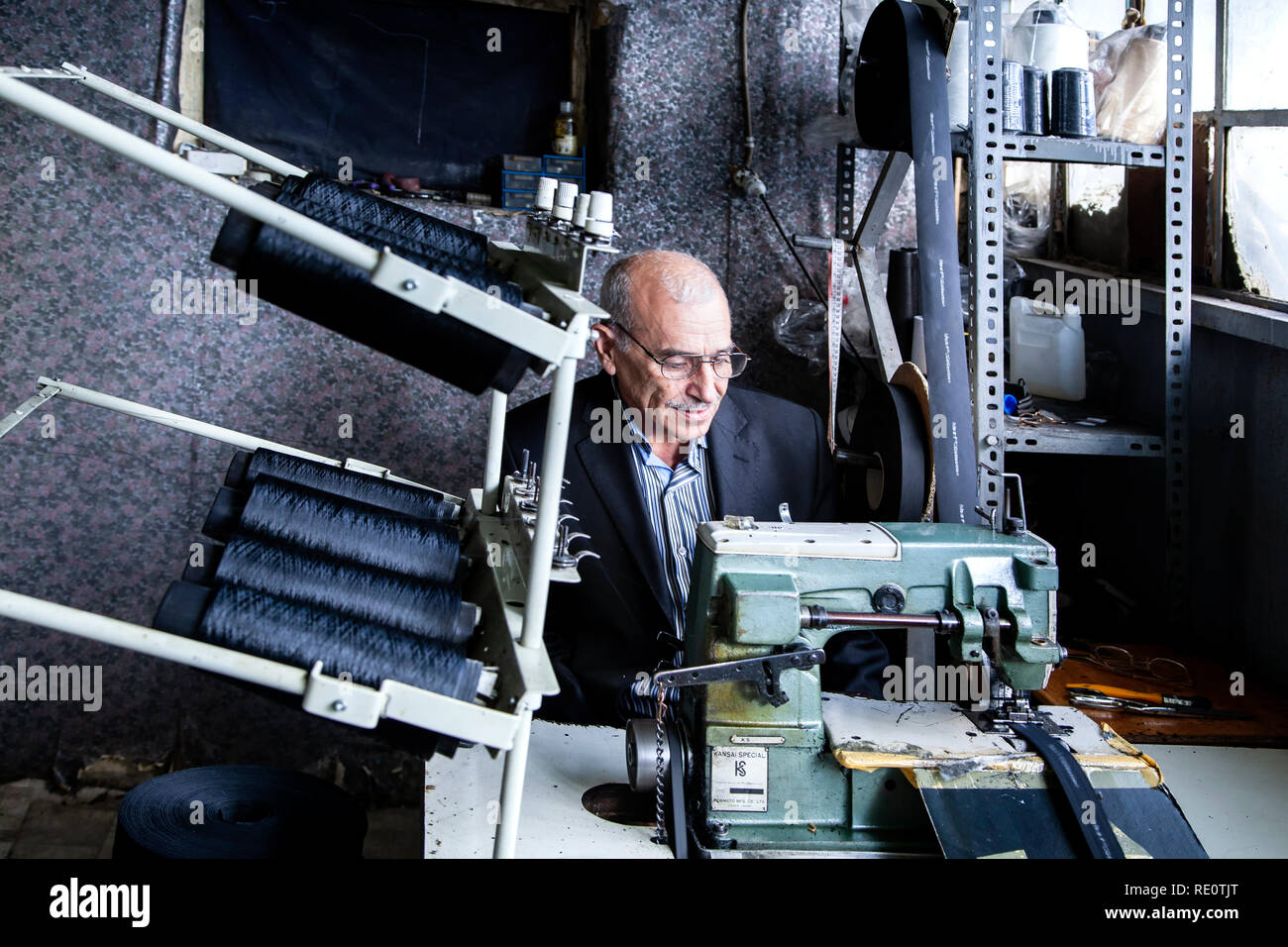 Textile worker, "han" workshop, Istanbul, Turkey Stock Photo - Alamy