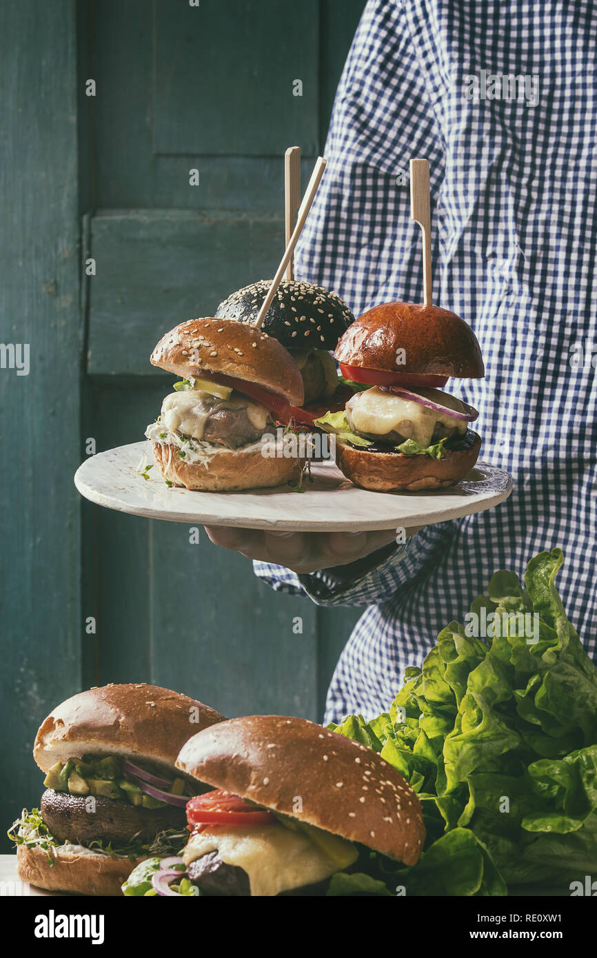 Mini burgers and people hi-res stock photography and images - Alamy