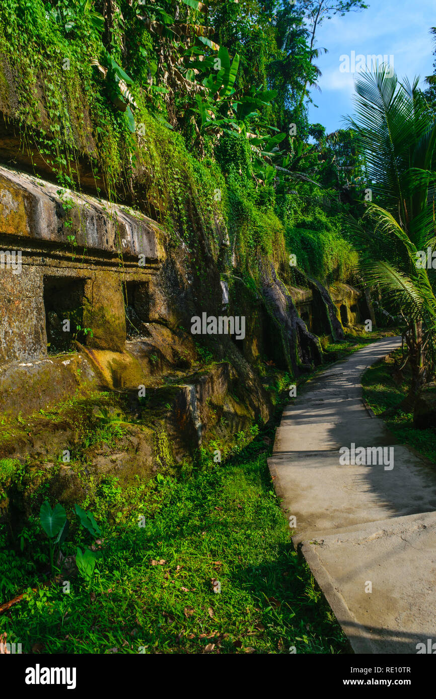 Carved in the stone ancient Gunung Kawi Temple with royal tombs ...