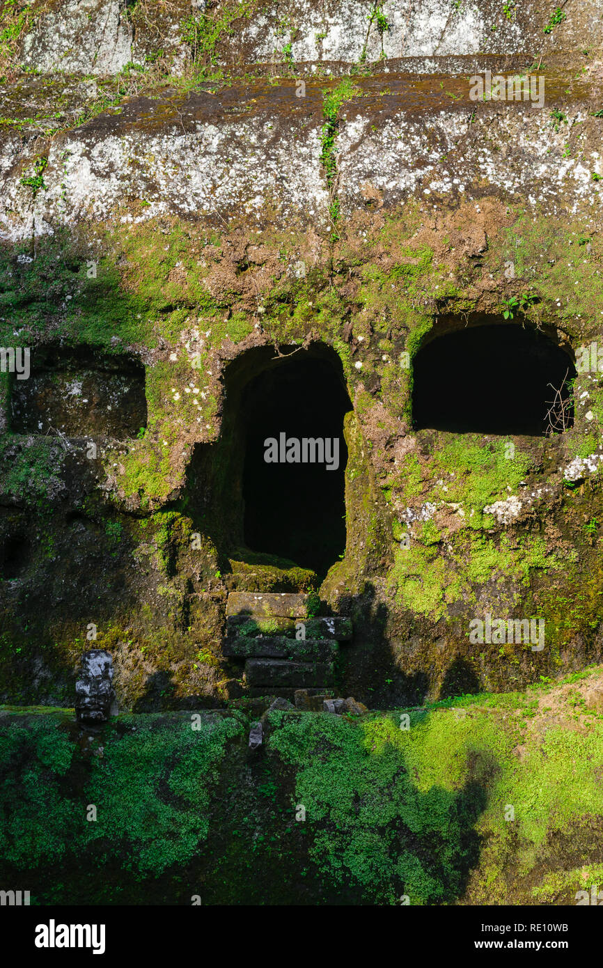 Carved in the stone ancient Gunung Kawi Temple with royal tombs ...