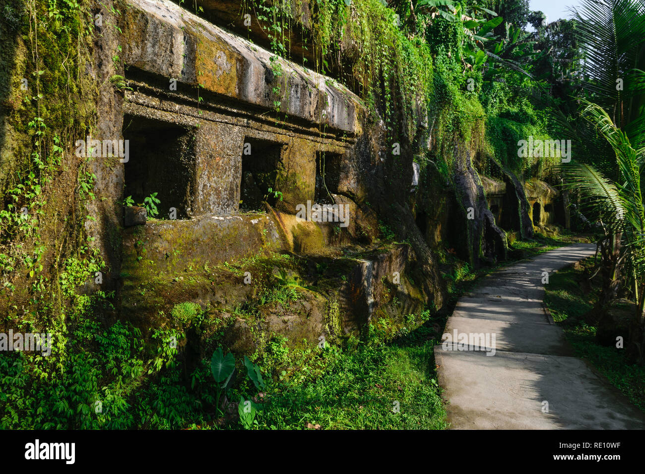 Carved in the stone ancient Gunung Kawi Temple with royal tombs ...