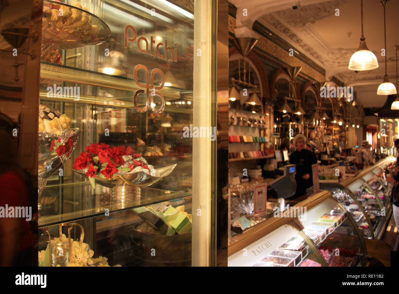 Cakes and chocolates in the showcases of the confectionery department ...