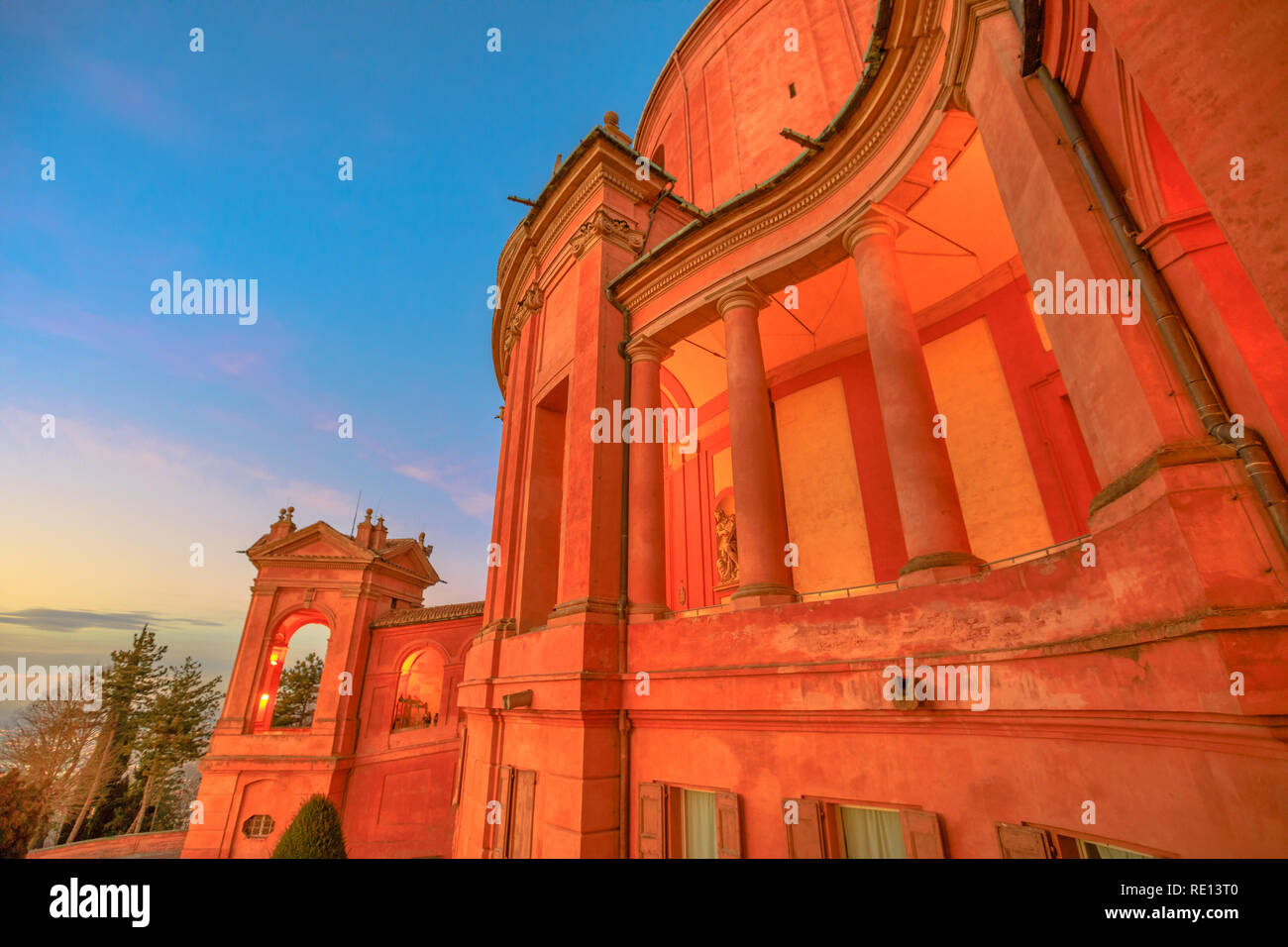 Side view of facade of Sanctuary of Madonna di San Luca and arcades of ...
