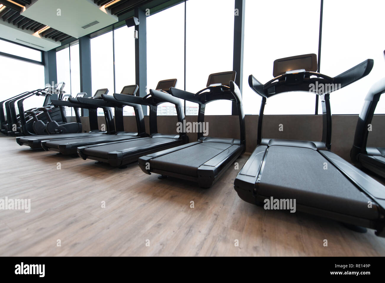Modern Gym Room Fitness Center With Equipment And Machines Stock Photo ...