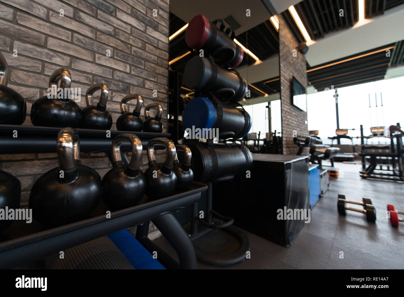 Modern Gym Room Fitness Center With Equipment And Machines Stock Photo ...