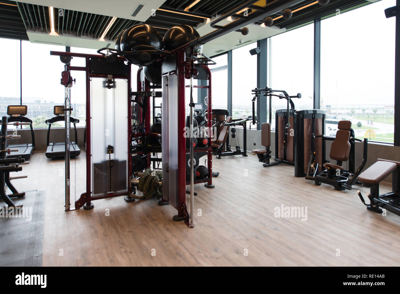 Modern Gym Room Fitness Center With Equipment And Machines Stock Photo ...