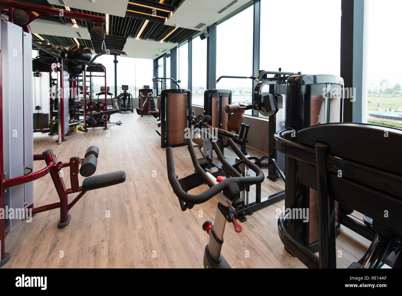Modern Gym Room Fitness Center With Equipment And Machines Stock Photo ...
