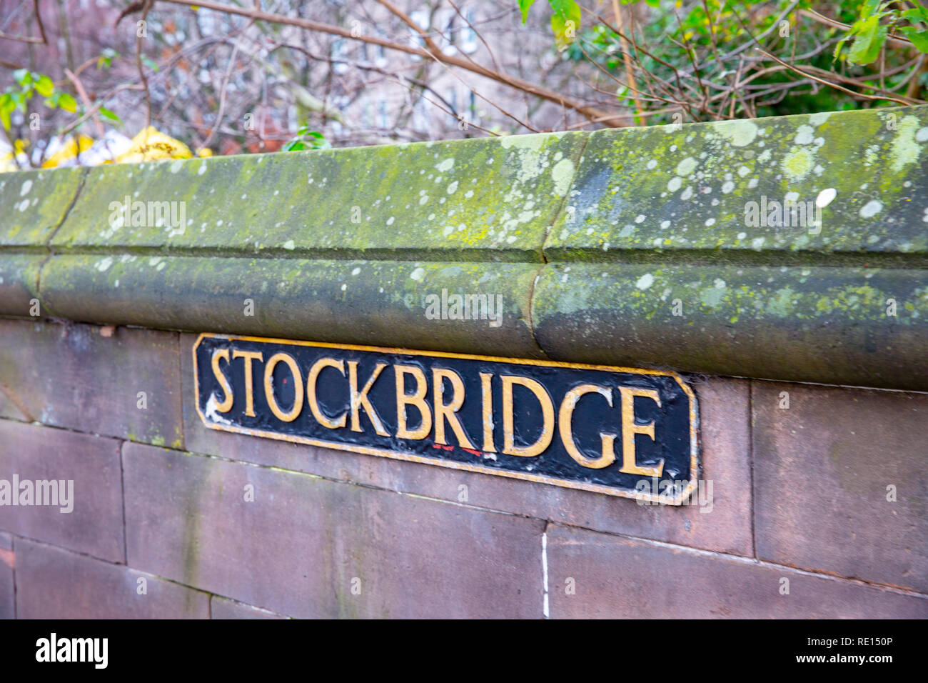 Traditional street sign in black and gold for Stockbridge, suburb of ...