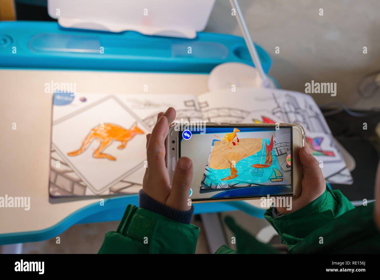 Zhongshan,China-February 8, 2018:kid playing Augmented Reality popup ...