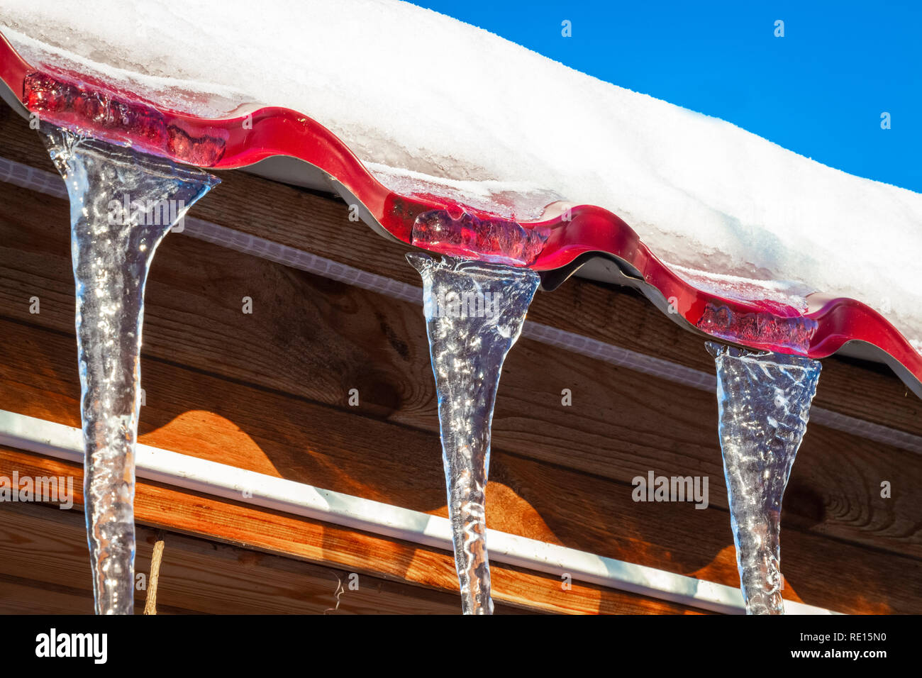 Ice snow drip from roof hi-res stock photography and images - Alamy