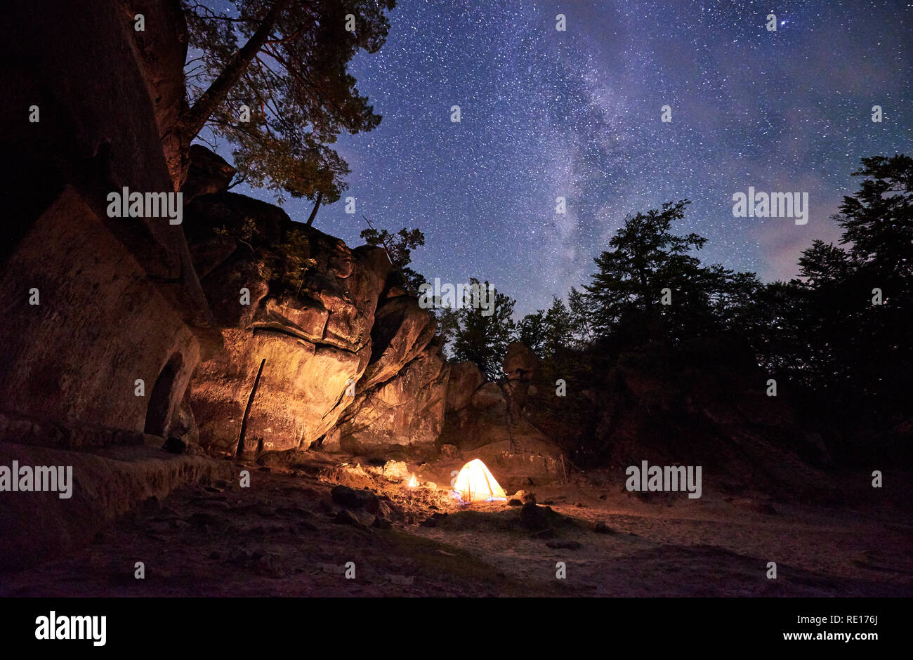 Rock formation at night with starry sky and milky way hi-res stock ...