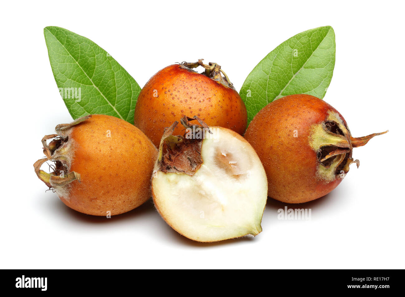 Medlar fruit with green leaves isolated on white background Stock Photo ...