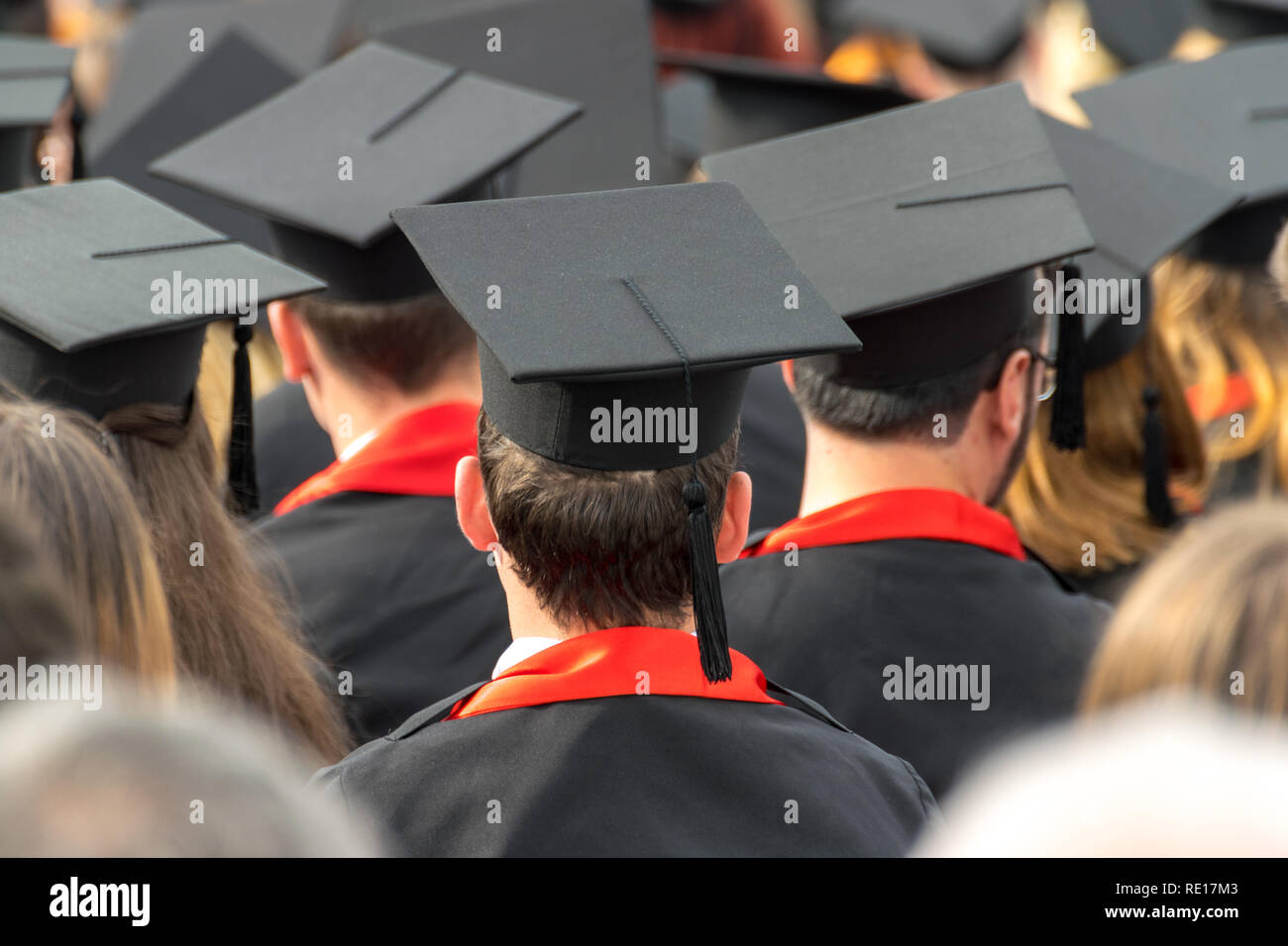 Yong student wearing graduation caps at a graduation ceremony Stock ...