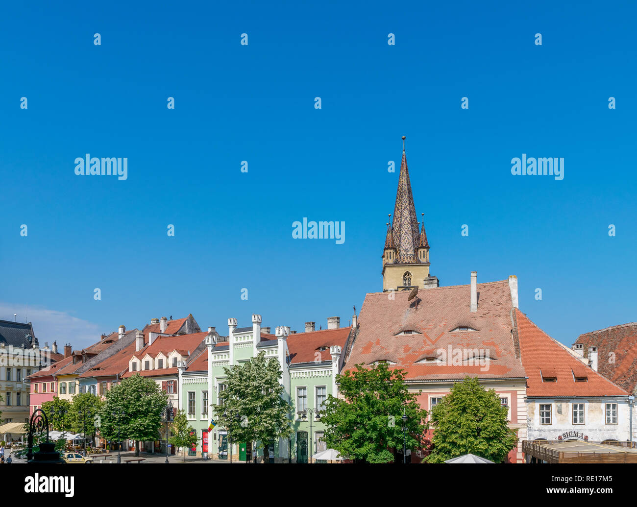 A view to the Sibiu little square and Lutheran Cathedral of Saint Mary ...
