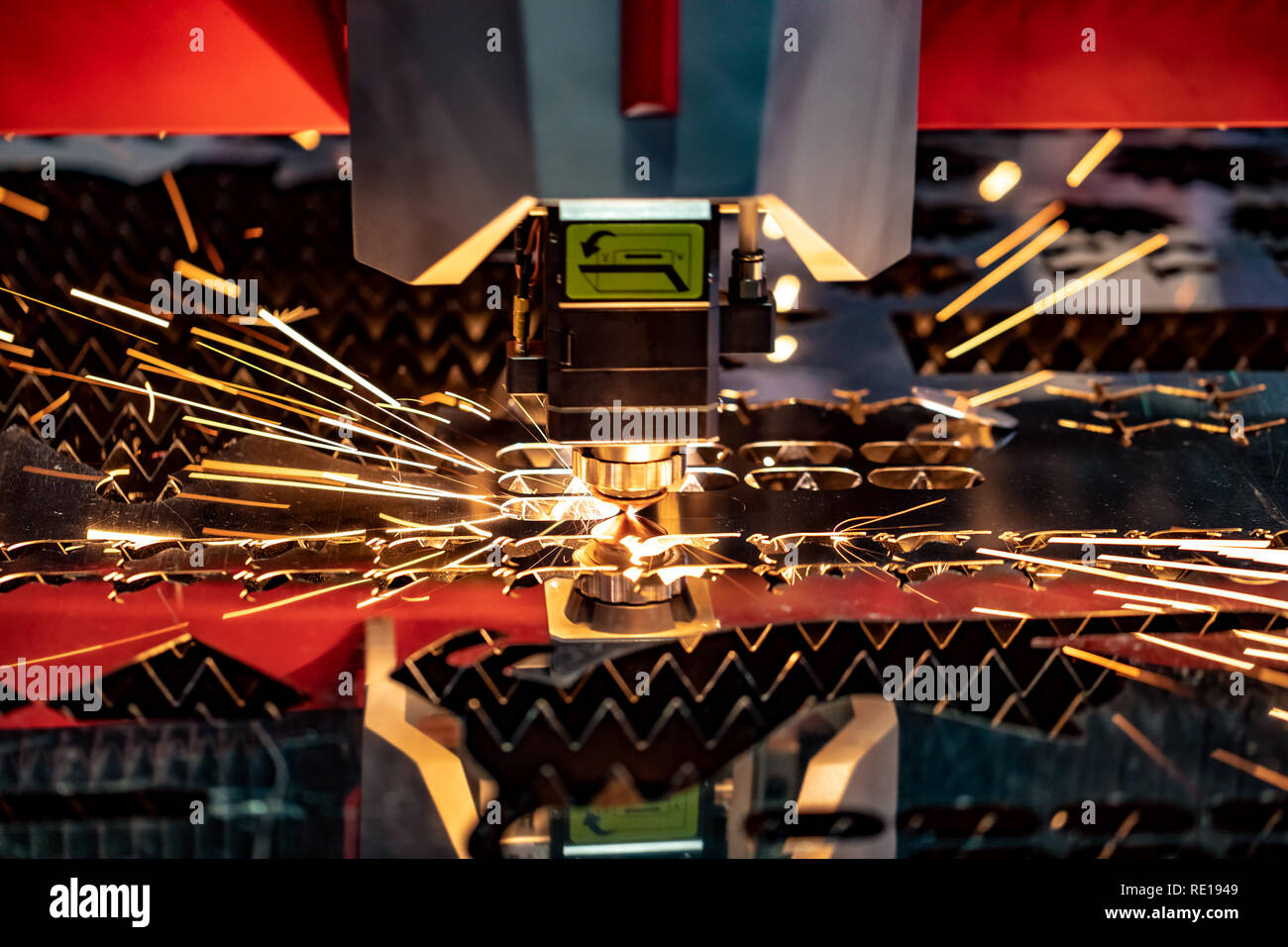 CNC Laser cutting of metal, modern industrial technology. Small depth ...