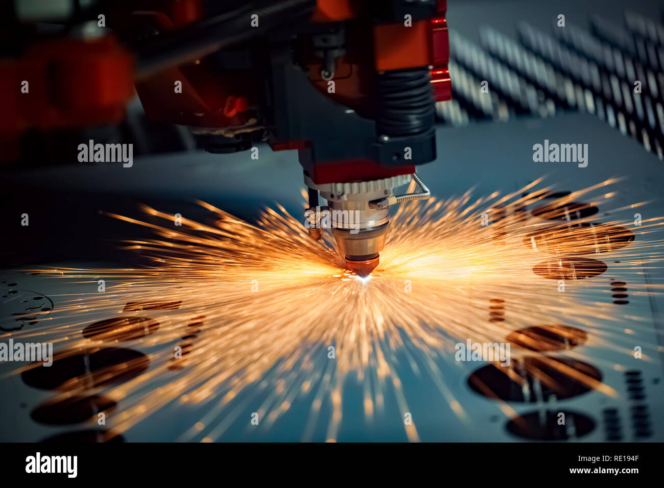 CNC Laser cutting of metal, modern industrial technology. Small depth ...