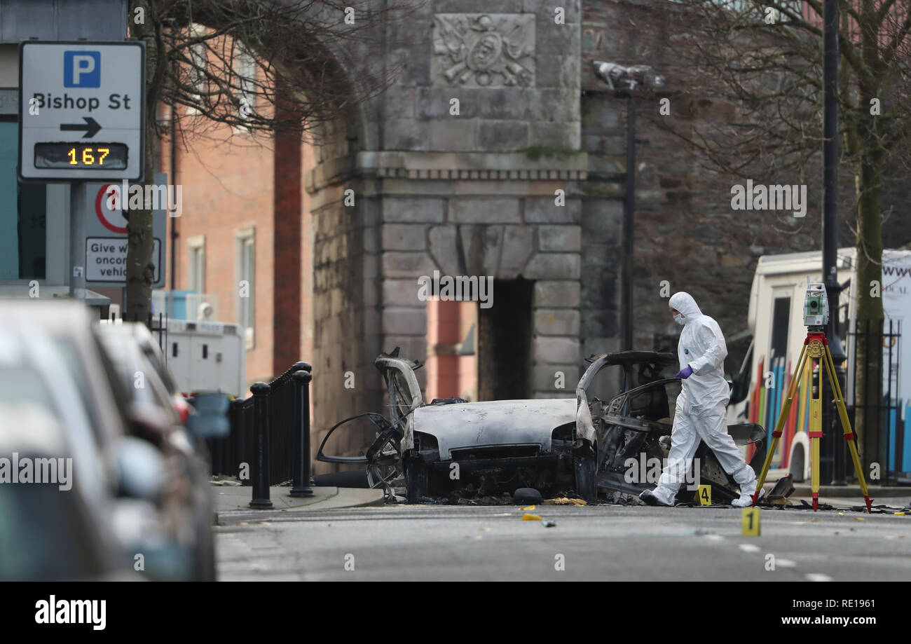 Forensic investigators at the scene of a car bomb blast on Bishop ...
