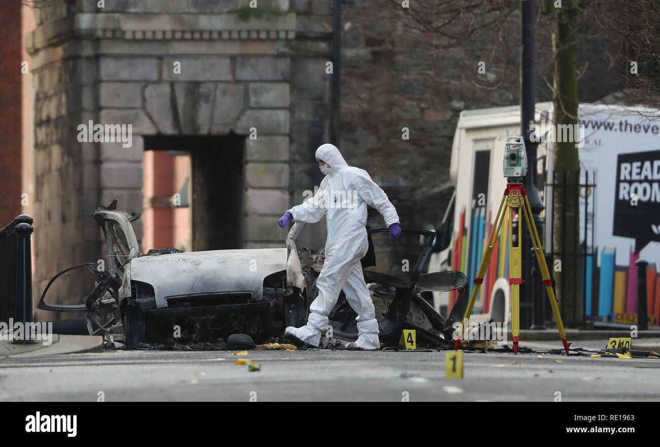 Forensic investigators at the scene of a car bomb blast on Bishop ...