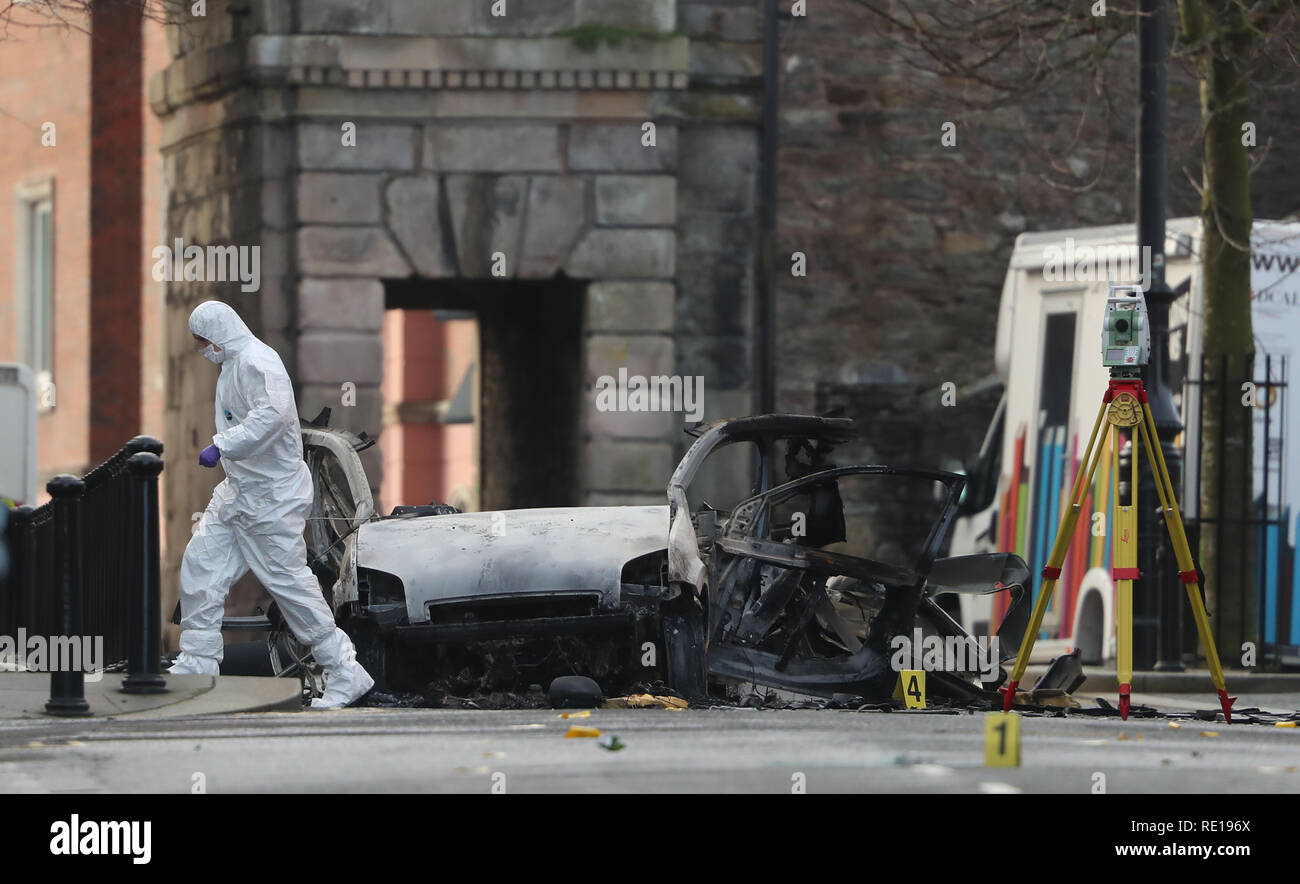Forensic investigators at the scene of a car bomb blast on Bishop ...