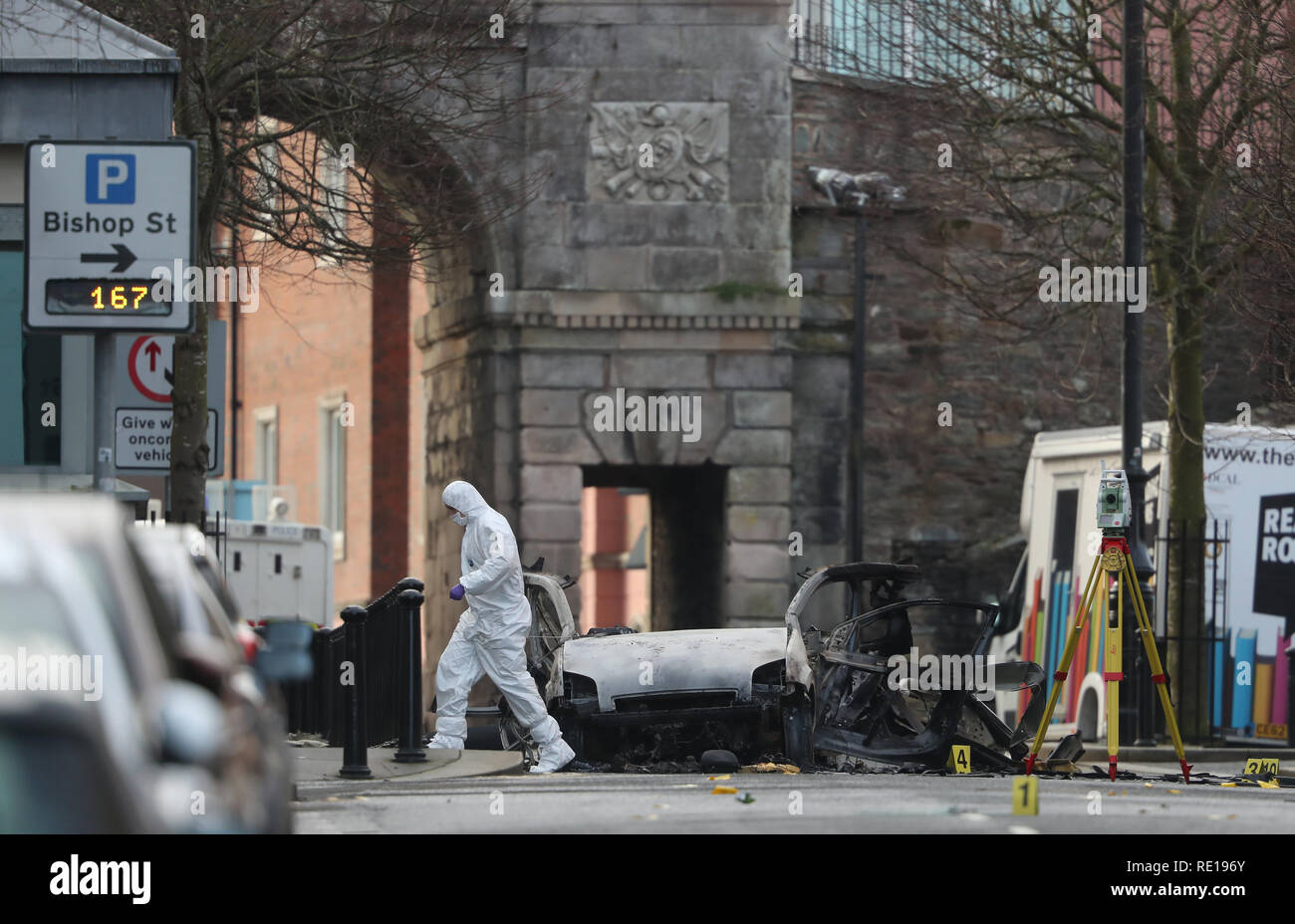 Forensic investigators at the scene of a car bomb blast on Bishop ...