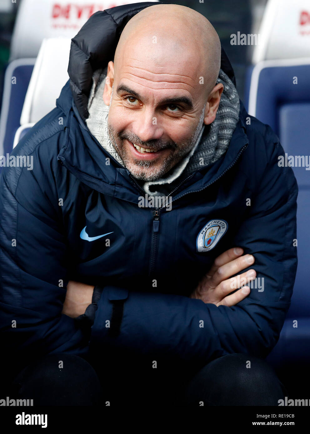 Manchester City manager Pep Guardiola on the bench prior to the Premier ...