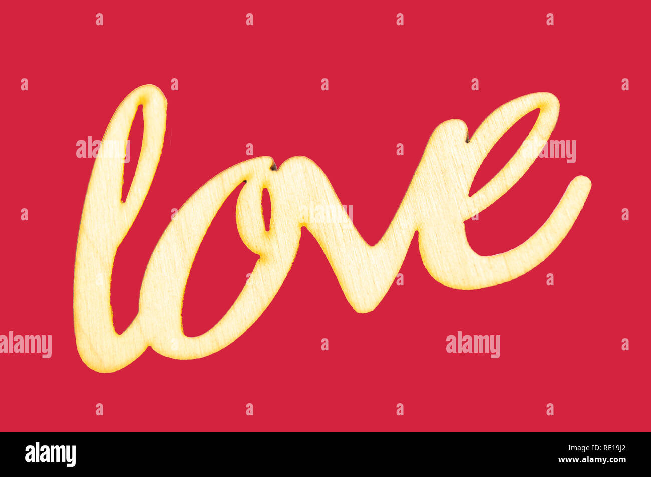 Wooden word love on red isolated background Stock Photo - Alamy