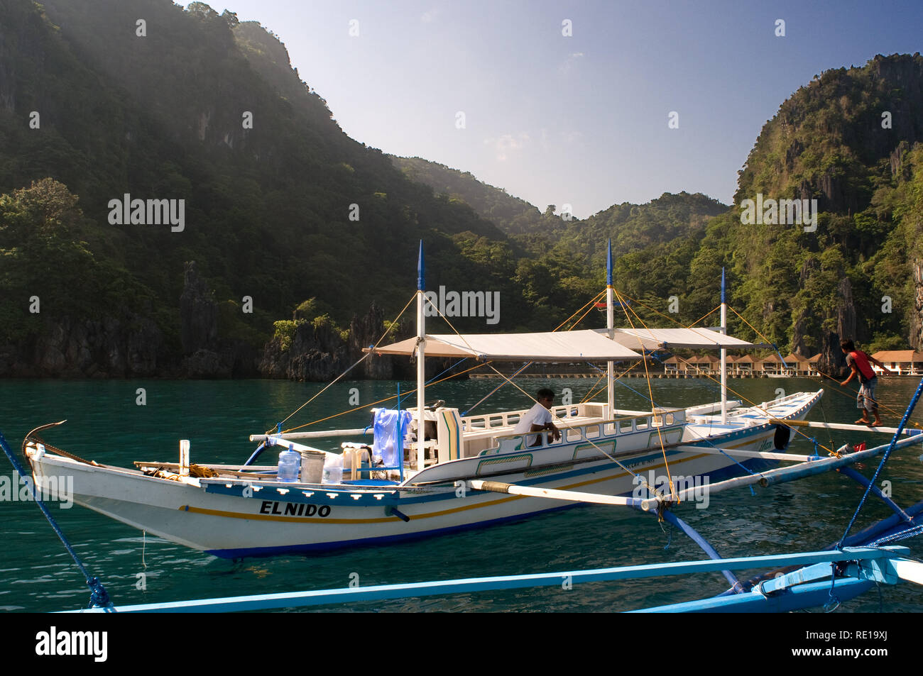 A boat in font of El nido resorts Miniloc island, Bacuit archipelago ...