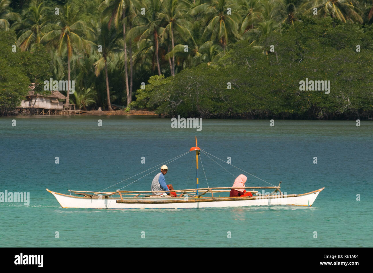 Local fishers in a boat in Snake Island, which takes its name because ...