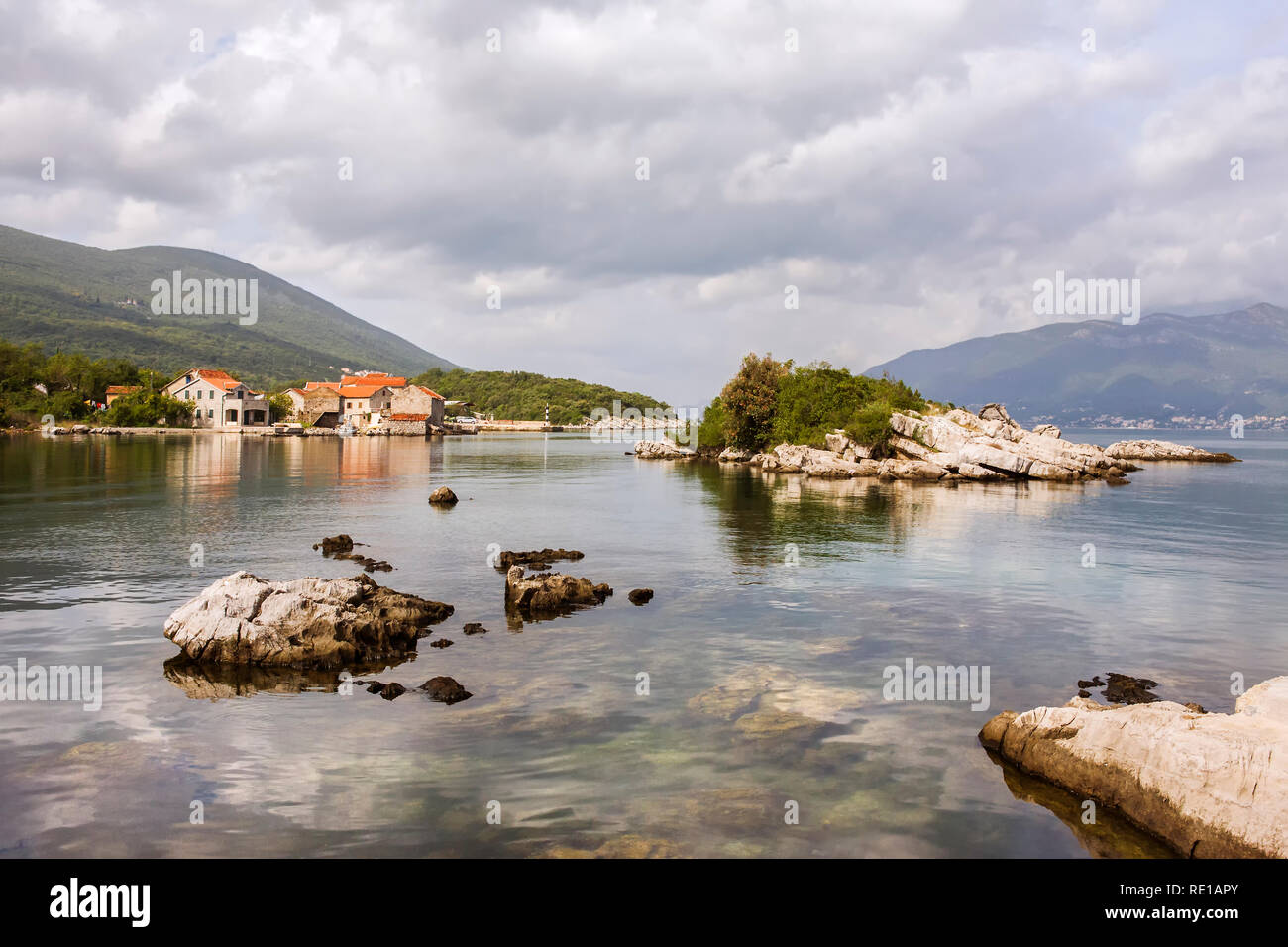 The beautiful little hamlet of Bjelila, and the islet of Skolj on Boka ...