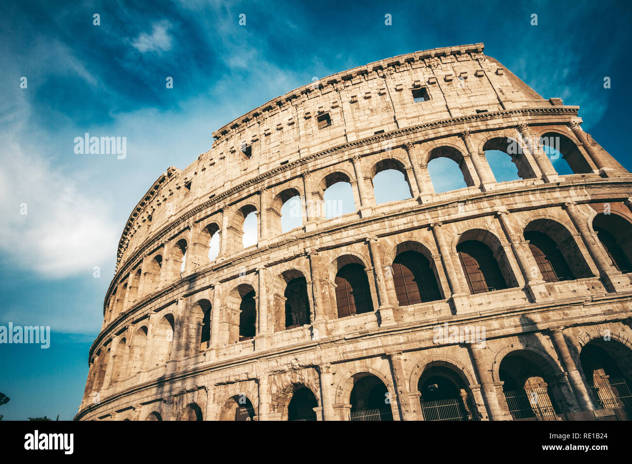 The ancient Colosseum in Rome at sunset Stock Photo - Alamy