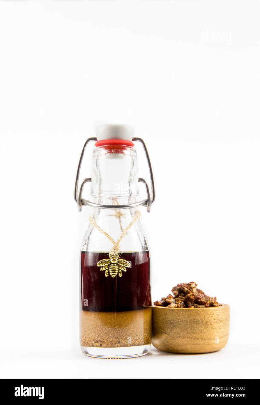 Propolis or bee glue is a resinous mixture that honey bees produce by ...