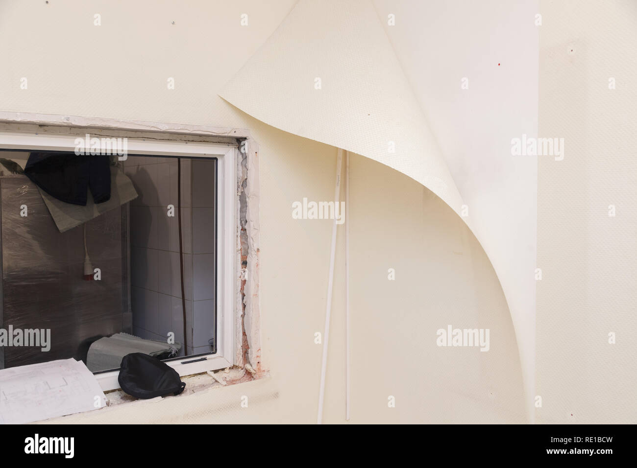 Repair and replacement windows in office building, destroyed window ...