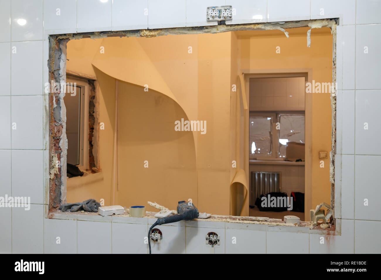 Repair and replacement windows in office building, destroyed window ...