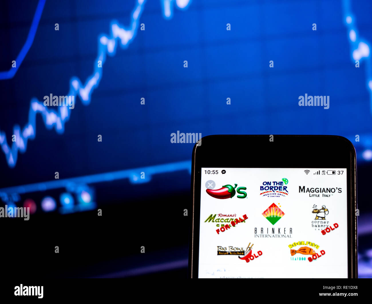 Brinker International Restaurant company logo seen displayed on smart ...