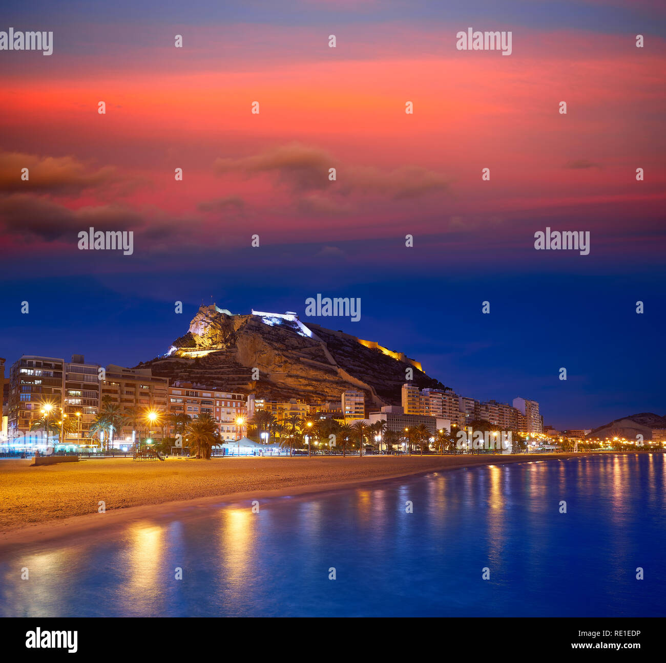 Alicante skyline at sunset from Postiguet beach in spain Stock Photo ...