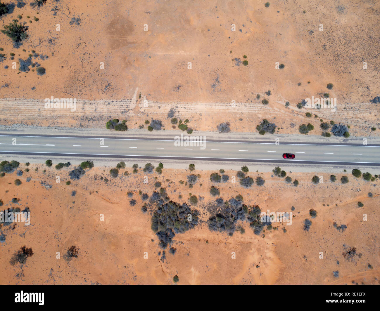 Aerial of the sealed highway passing the the outback to the opal fields ...