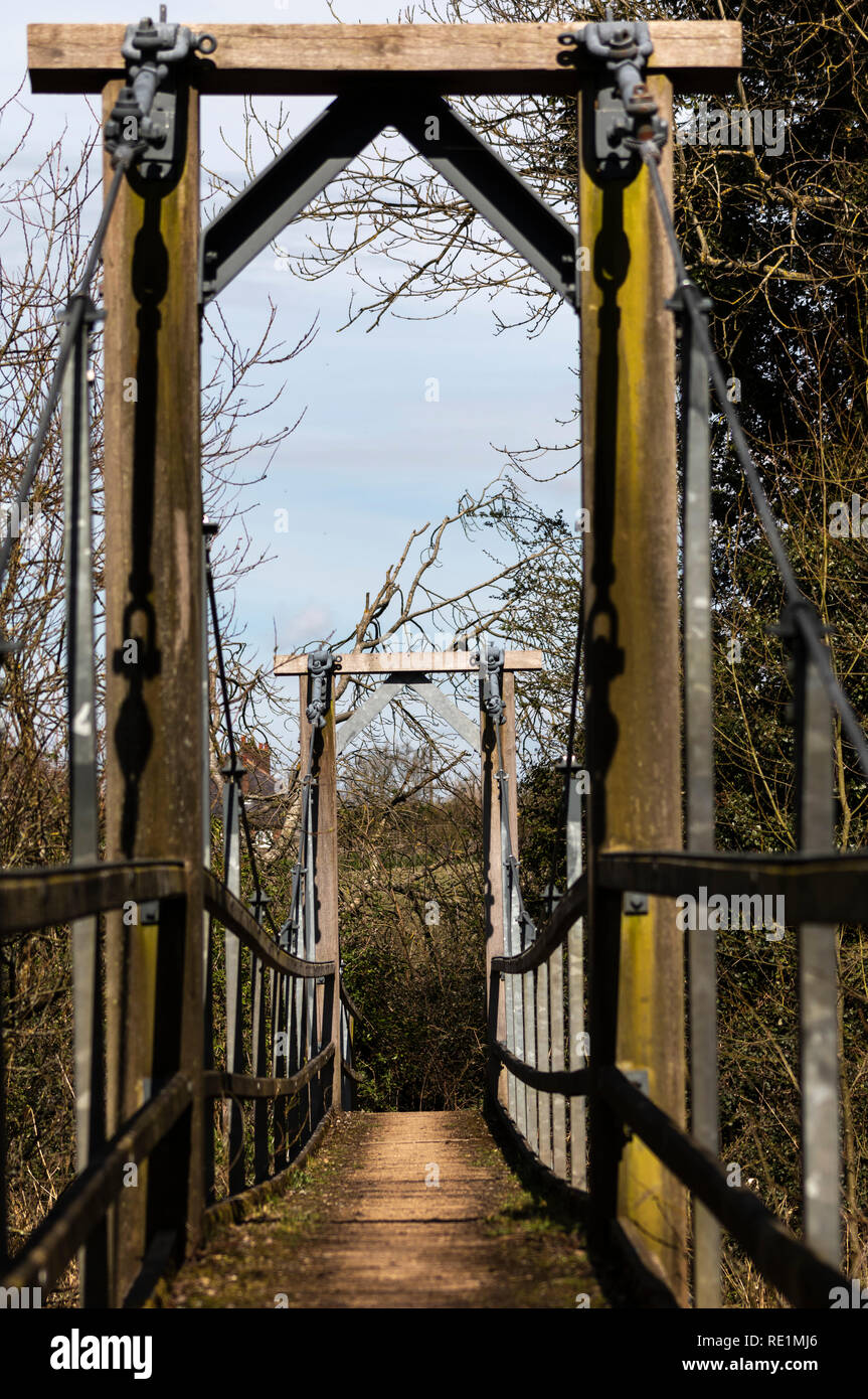 view looking along a Wooden footbridge in the countryside Stock Photo ...
