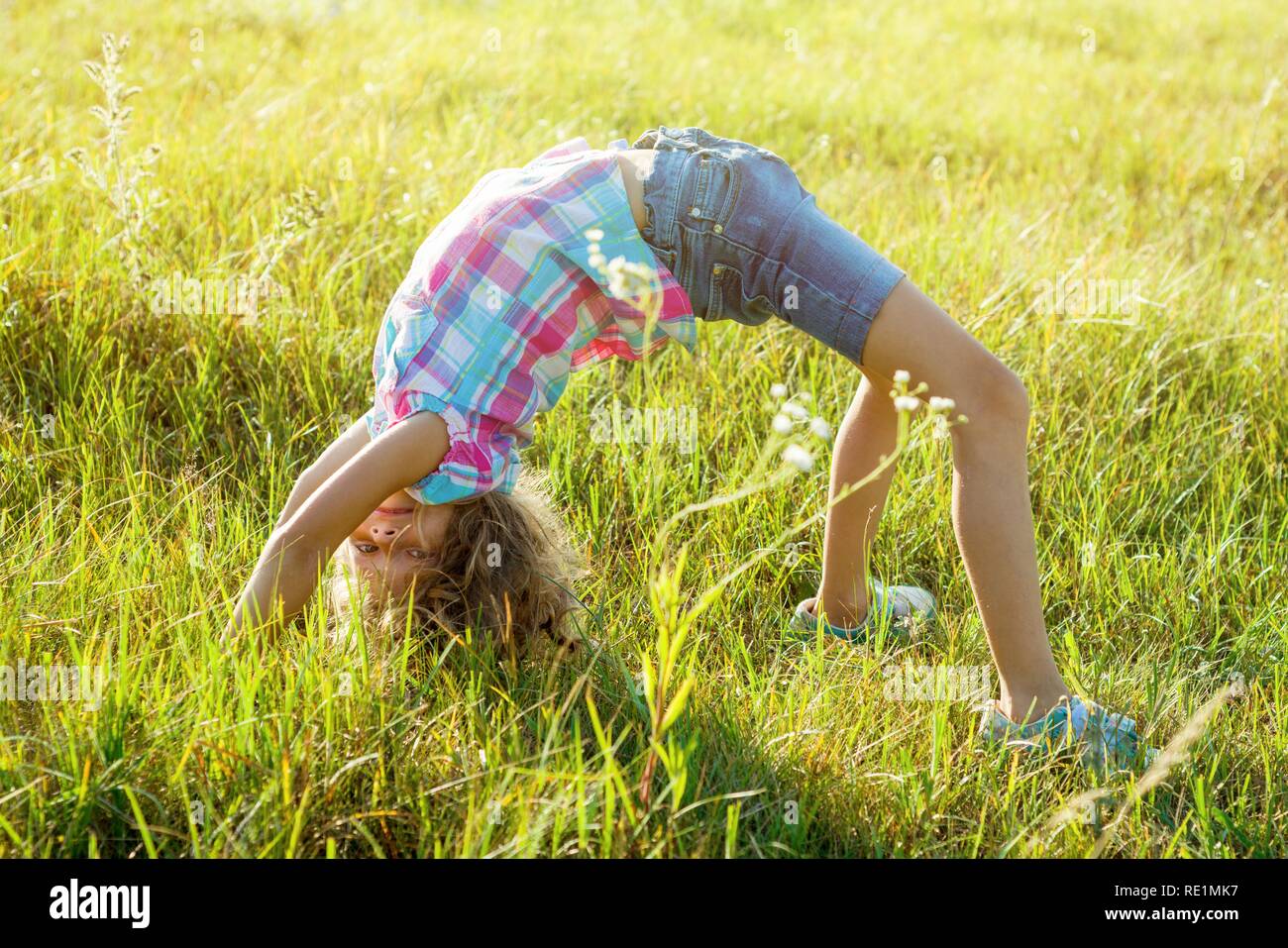 Headstand kid hi-res stock photography and images - Alamy
