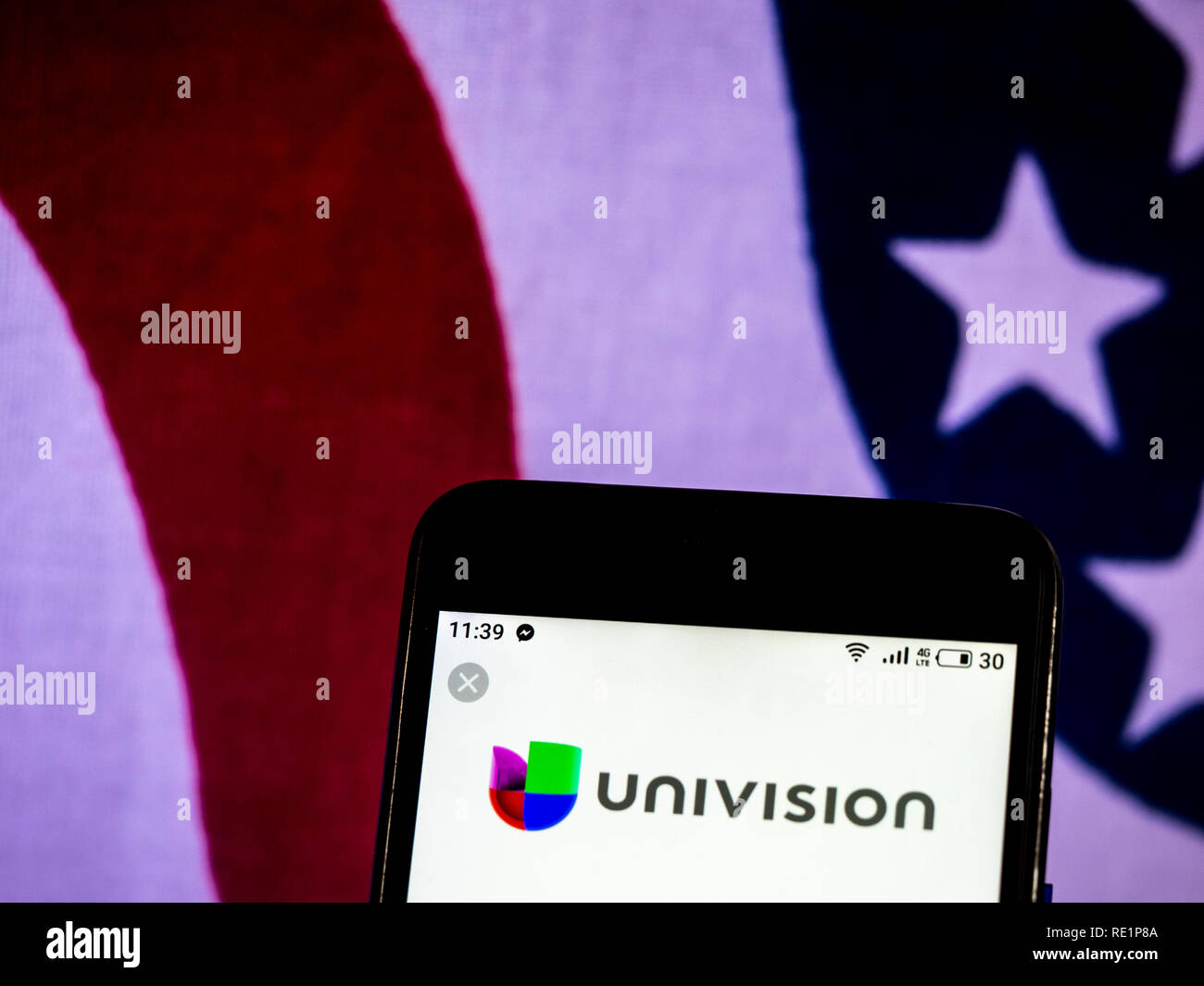 Univision Television network logo seen displayed on smart phone Stock ...