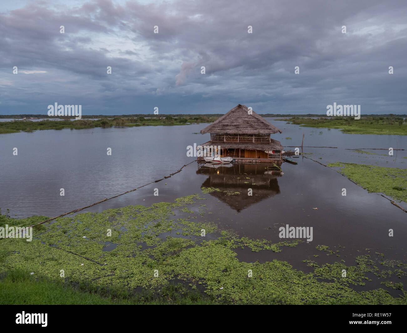 Iquitos, Peru- March 29, 2018: View of a floating house and the Itaya ...