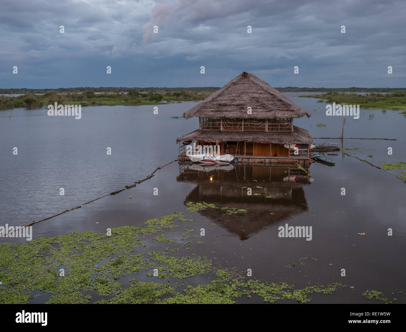 Iquitos, Peru- March 29, 2018: View of a floating house and the Itaya ...