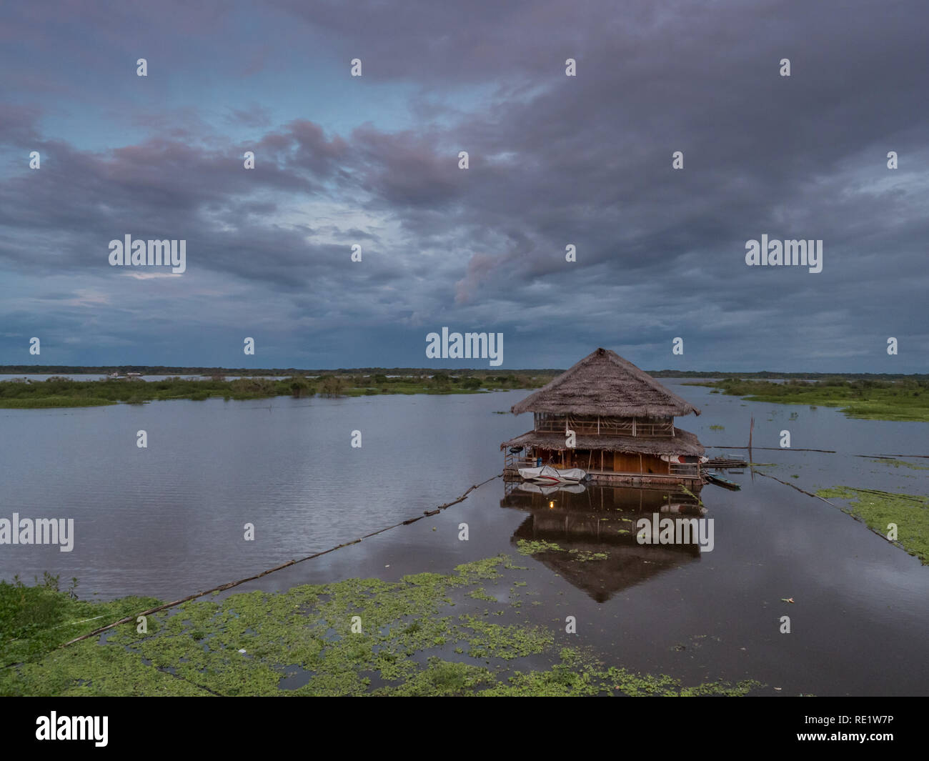 Iquitos, Peru- March 29, 2018: View of a floating house and the Itaya ...