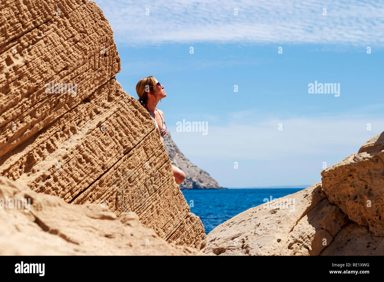 Woman sunbathing beach spain hi-res stock photography and images - Alamy