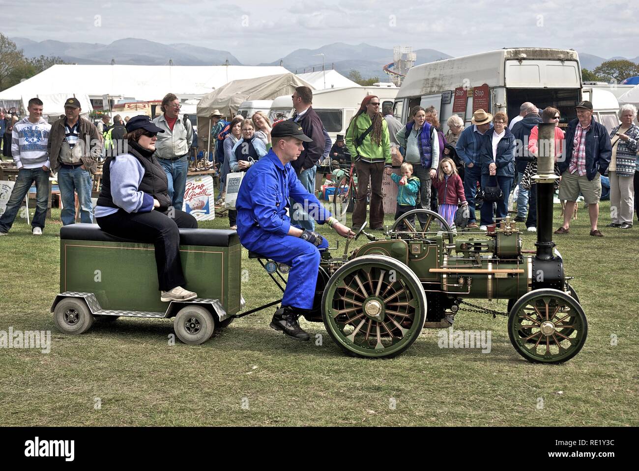 A miniature steam traction engine being driven at the Anglesey Vintage ...