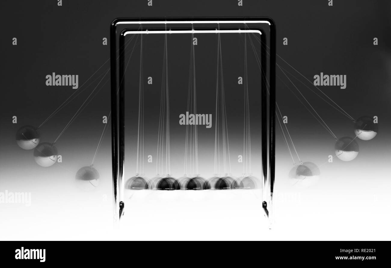 Newton's cradle, ball pendulum Stock Photo - Alamy
