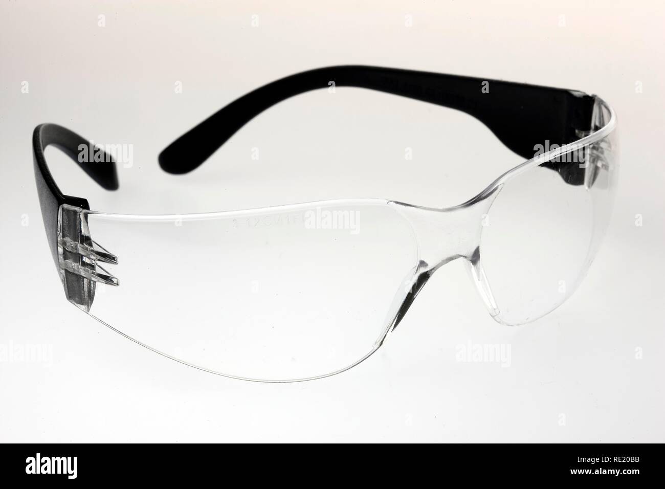 Plastic safety glasses, without shade, work glasses Stock Photo - Alamy