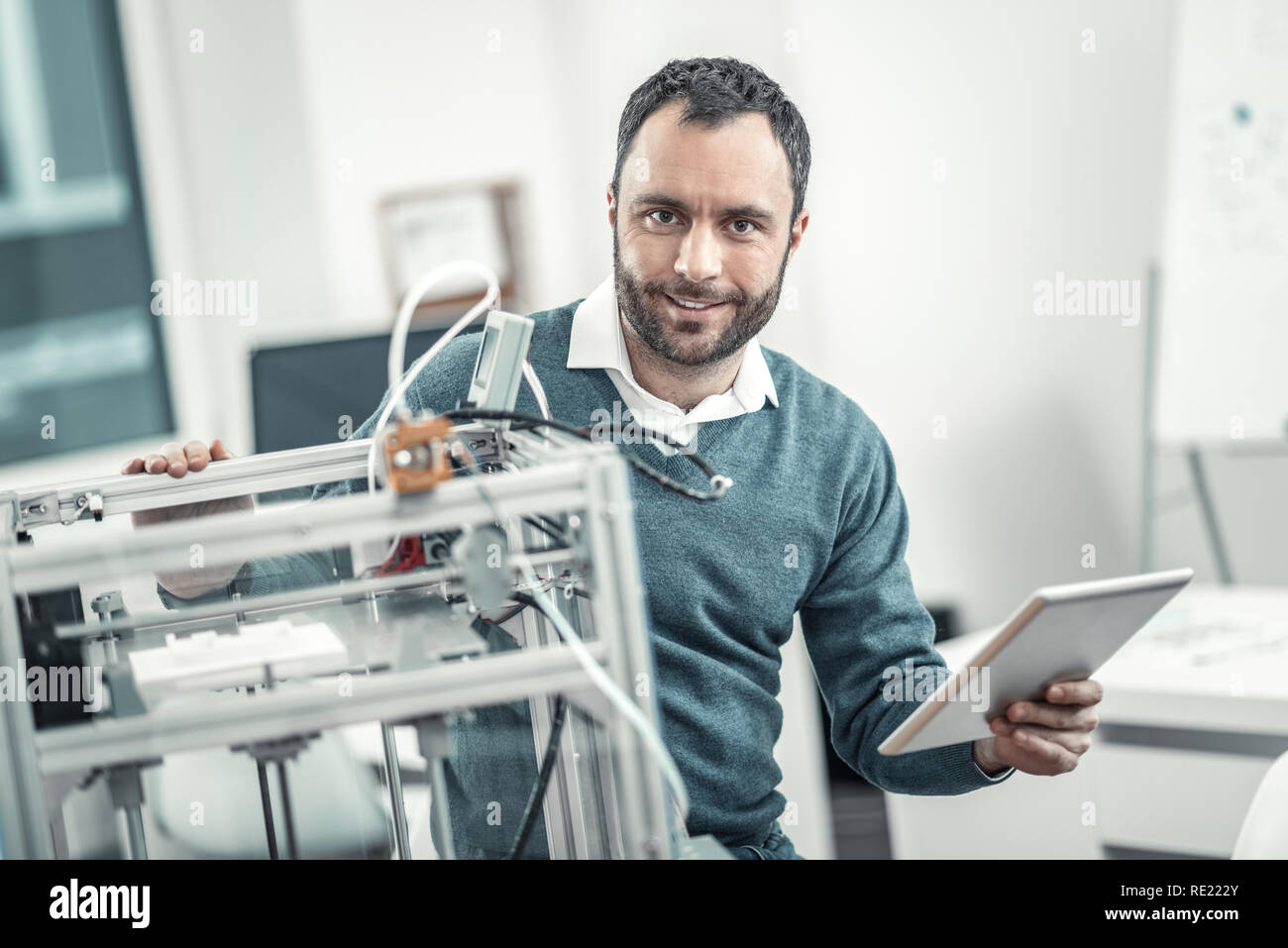 Positive nice adult man using 3d technology Stock Photo - Alamy