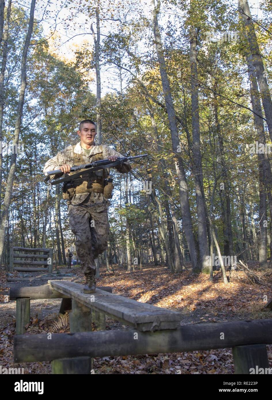 A U.S. Marine candidate with Officer Candidate School (OCS) runs across ...