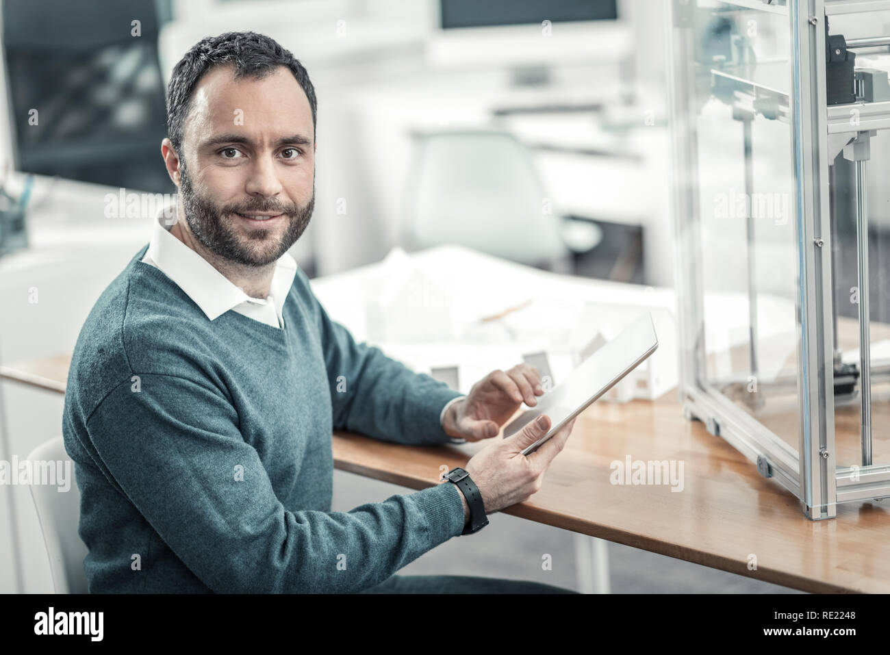 Delighted adult nice man looking at you Stock Photo - Alamy